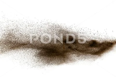Photograph: Deep Brown particles splattered on white background. Brown ...