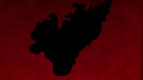 Deep dark red liquid blood ink flows spu... | Stock Video | Pond5