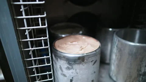 Deep freezing chocolate ice cream in ste... | Stock Video | Pond5