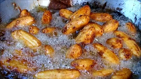 Deep fried saba banana | Stock Video | Pond5