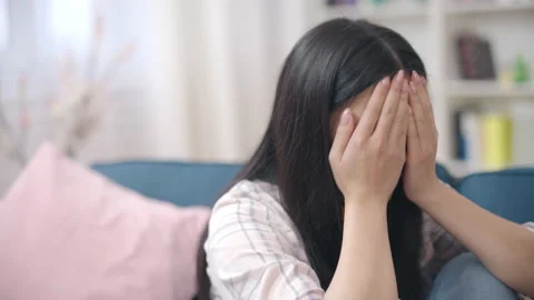 Deeply upset Asian woman crying, problem... | Stock Video | Pond5