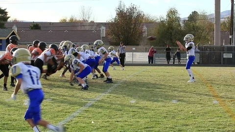 defense breaks line for hard hit on runn... | Stock Video | Pond5