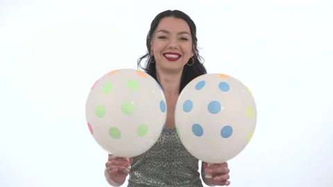Deflated Party Balloons in the hands of ... | Stock Video | Pond5
