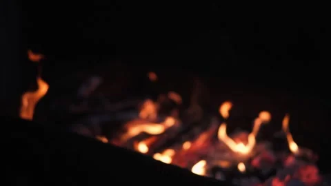 Defocused Fire flames on a black backgro... | Stock Video | Pond5