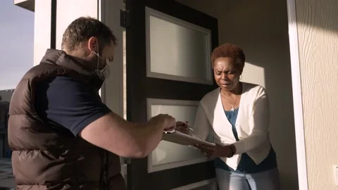 Delivery man waiting for customer signin... | Stock Video | Pond5