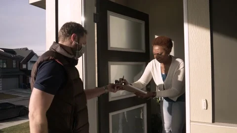 Delivery man waiting for customer signin... | Stock Video | Pond5