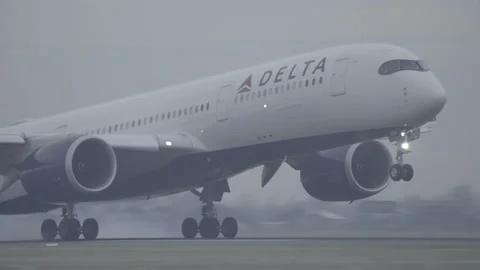 Delta Airbus A350 Passenger Airplane Lan... | Stock Video | Pond5
