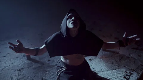 Demonic Monk in a Satanic Ritual calling... | Stock Video | Pond5