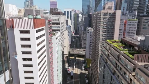 The densely packed buildings and roads o... | Stock Video | Pond5