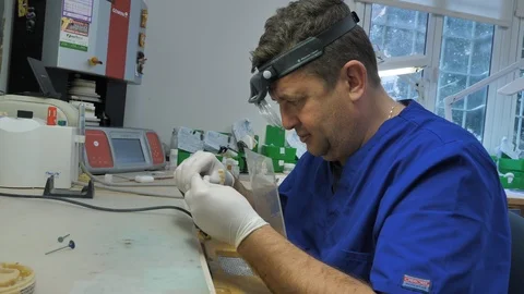 Dental expert in his lab | Stock Video | Pond5