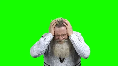 Depressed old man on green screen. | Stock Video | Pond5