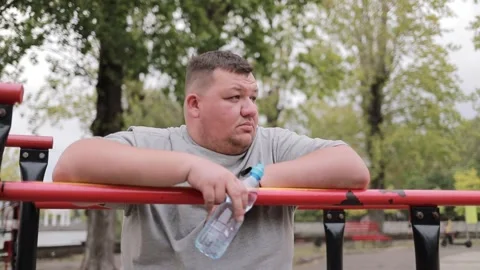 Depressed young fat man, he has obesity ... | Stock Video | Pond5