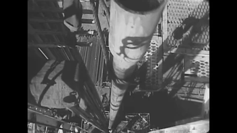 A derrick man stacks his last bit of dri... | Stock Video | Pond5