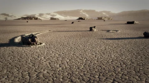 Desert sailing stones moving under risin... | Stock Video | Pond5
