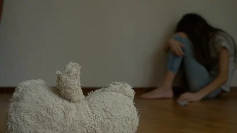 a desperate child in depression sits at ... | Stock Video | Pond5