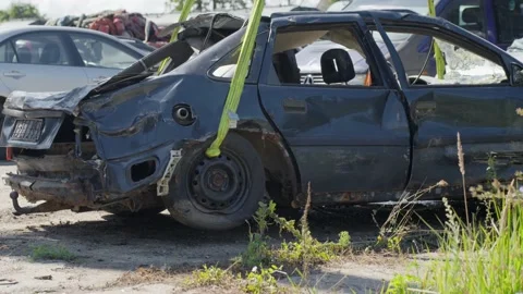 Destroyed car frame is lifted with heavy... | Stock Video | Pond5