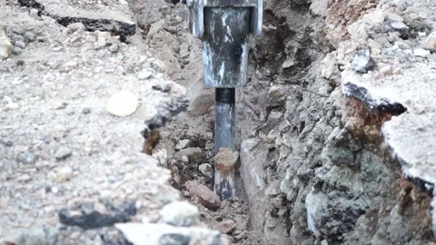 Destruction of solid soil rock with pneu... | Stock Video | Pond5