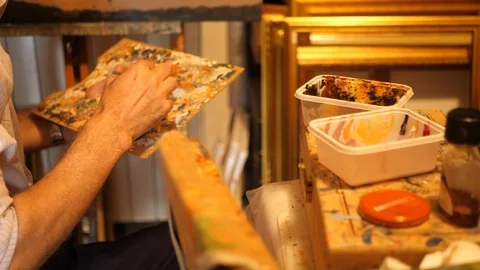 Detail of an artist hand and paint palet... | Stock Video | Pond5