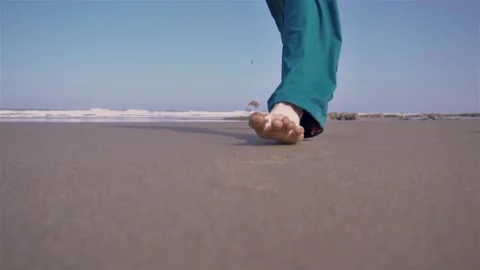 Detail of male feet walk barefoot toward... | Stock Video | Pond5