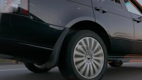 Detail of moving car wheel. The wheel of... | Stock Video | Pond5