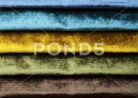 Detailed close up view on samples of cloth and fabrics in different ...