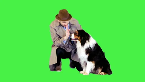Detective giving high five to his dog on... | Stock Video | Pond5