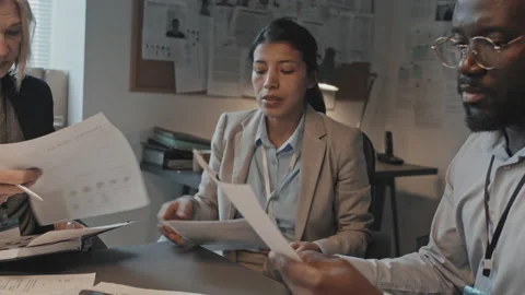 Detective At Teamwork Stock Footage ~ Royalty Free Stock Videos | Pond5