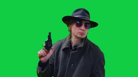Detective with Gun on Green Screen | Stock Video | Pond5