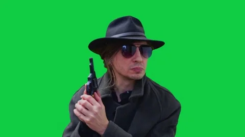 Detective with Gun on Green Screen | Stock Video | Pond5