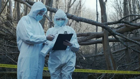 Detectives collecting evidence in a crim... | Stock Video | Pond5