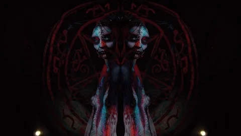 Devil girl with body painting on the who... | Stock Video | Pond5