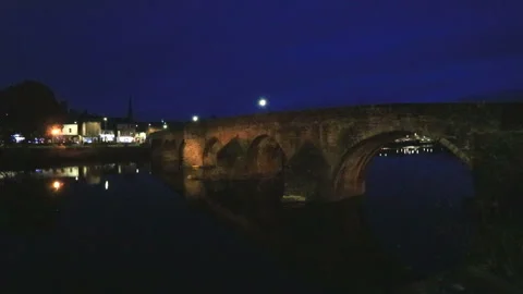 The Devorgilla bridge at night reflected... | Stock Video | Pond5