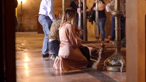 Devoted Women Kneeling In Prayer Inside ... | Stock Video | Pond5