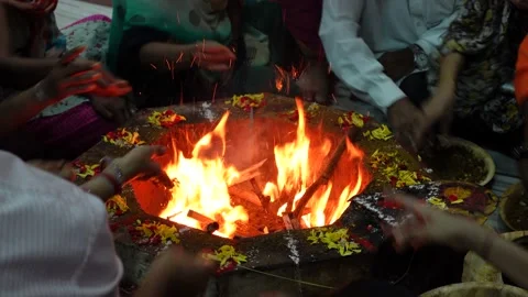Devotees performing Hawan, aarti and puj... | Stock Video | Pond5
