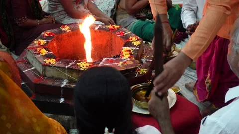 Devotees performing Hawan, aarti and puj... | Stock Video | Pond5