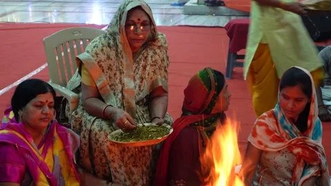 Devotees performing Hawan, aarti and puj... | Stock Video | Pond5