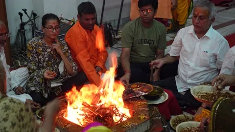 Devotees performing Hawan, aarti and puj... | Stock Video | Pond5