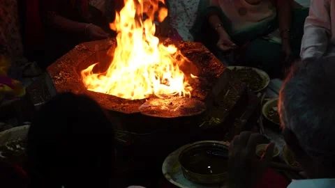 Devotees performing Hawan, aarti and puj... | Stock Video | Pond5