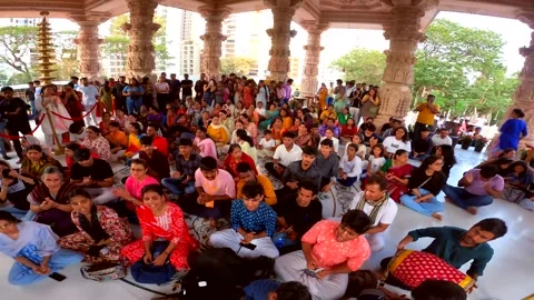 DEVOTI SINGING DEVOTIONAL SONG IN ISKON ... | Stock Video | Pond5