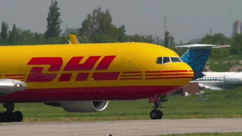 DHL cargo plane at Almaty airport, side ... | Stock Video | Pond5