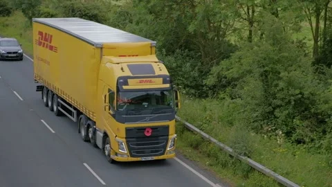 DHL lorry delivery service on a UK count... | Stock Video | Pond5