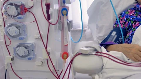 A dialysis machine connected by tubes to... | Stock Video | Pond5