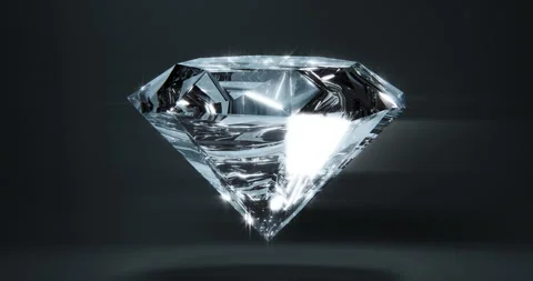 Diamond spinning in a loop against black... | Stock Video | Pond5