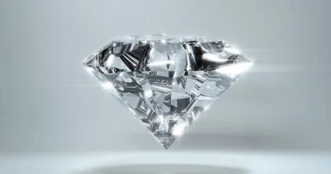Diamond spinning in a loop against white... | Stock Video | Pond5