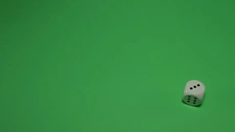 Dice Rolling number 3 on Green screen Ch... | Stock Video | Pond5