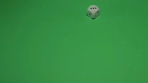 Dice Rolling number 3 on Green screen Ch... | Stock Video | Pond5