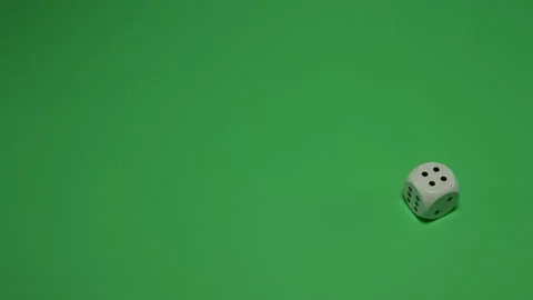 Dice Rolling number 4 on Green screen Ch... | Stock Video | Pond5