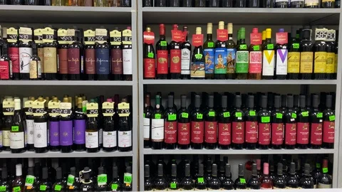 Different alcoholic beverages on display... | Stock Video | Pond5