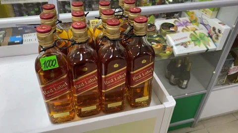 Different alcoholic beverages on display... | Stock Video | Pond5