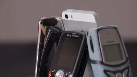 different generations of cell phones and... | Stock Video | Pond5